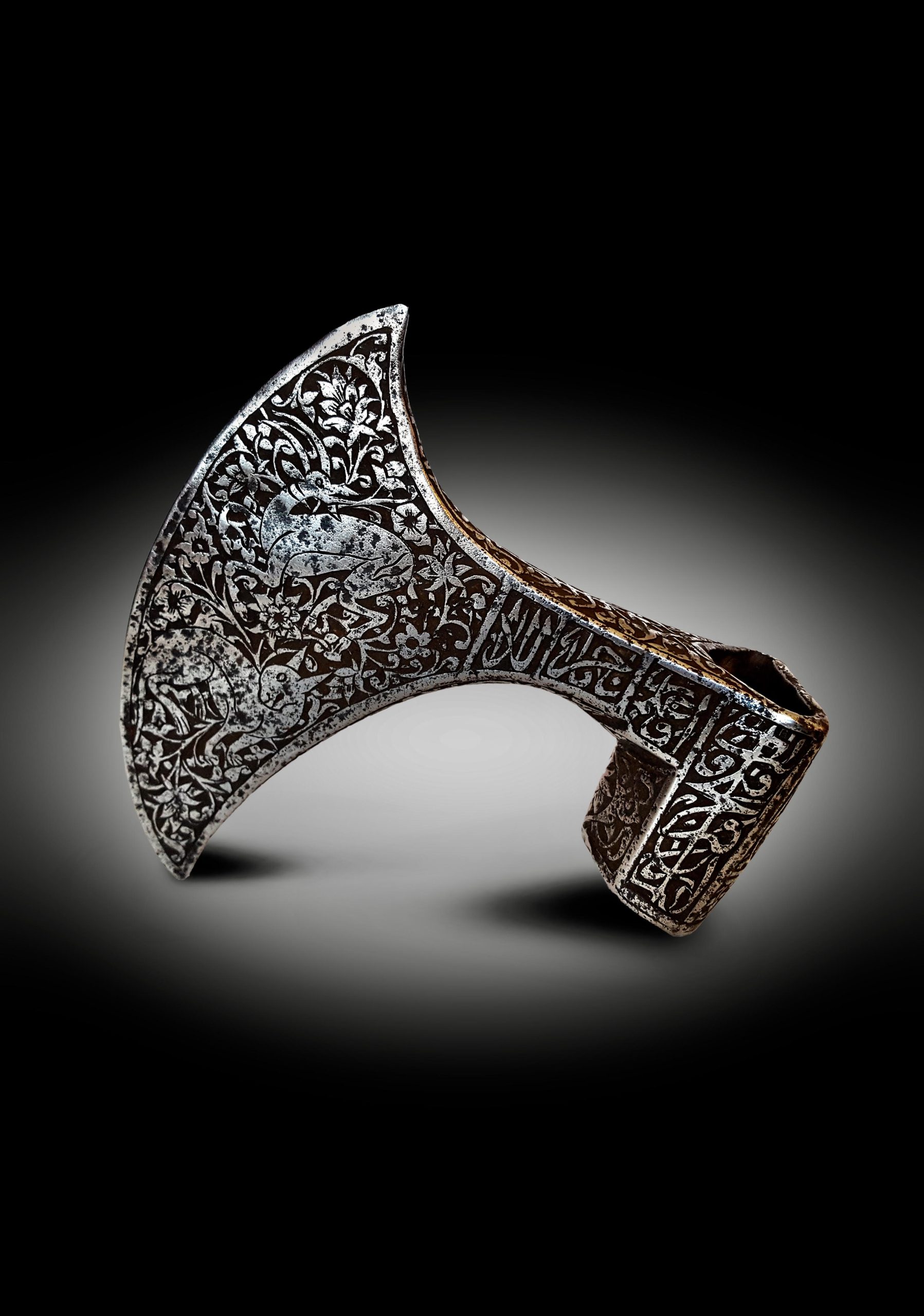 A SAFAVID DEEP CARVED ENGRAVED STEEL AXE - Hatefi collections