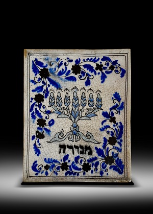 A HAND-PAINTED AND GLAZED HANUKKAH TILE - Hatefi collections